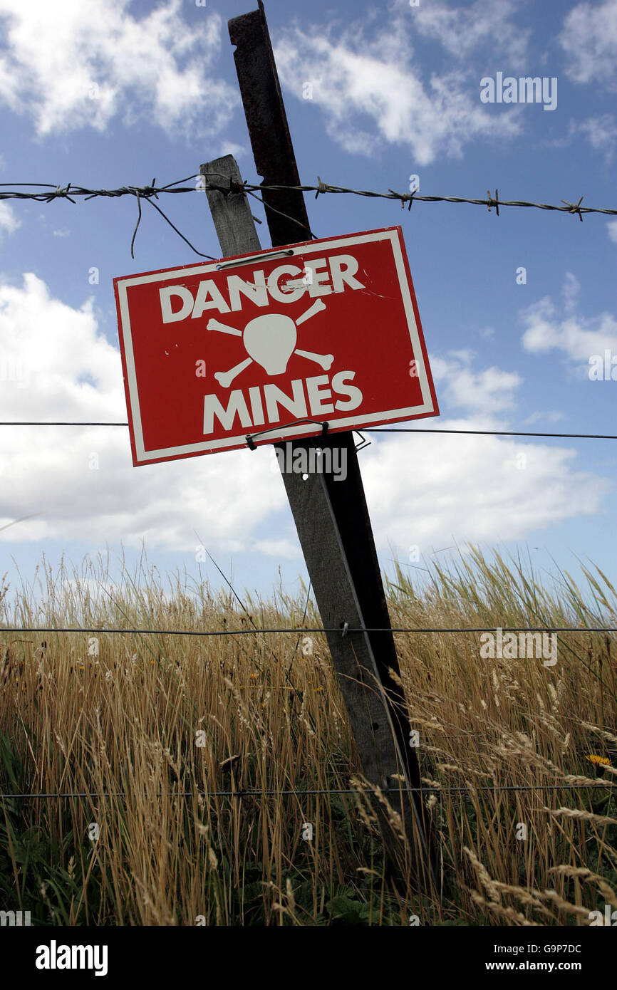 Danger mines sign on minefield hi-res stock photography and images - Alamy