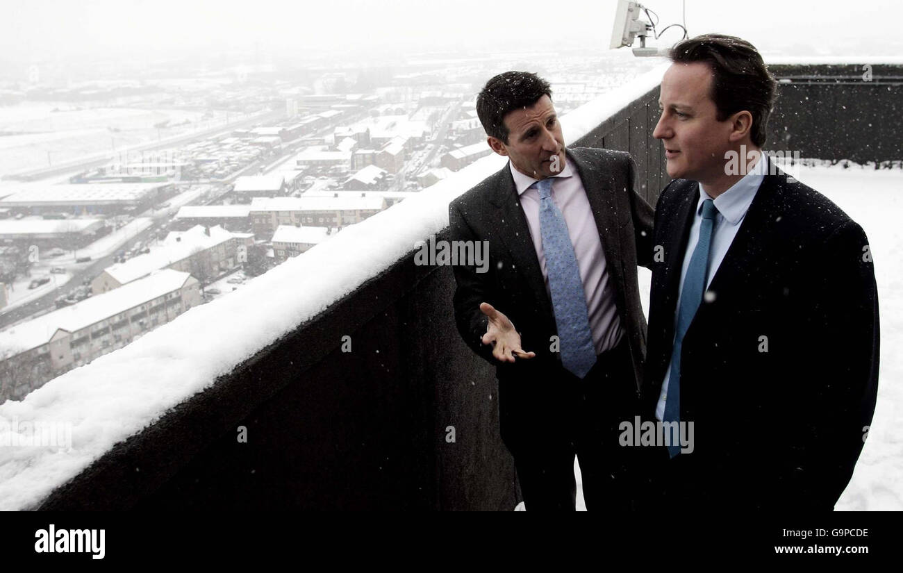 Leader of the Conservative Party David Cameron and Lord Coe look over ...
