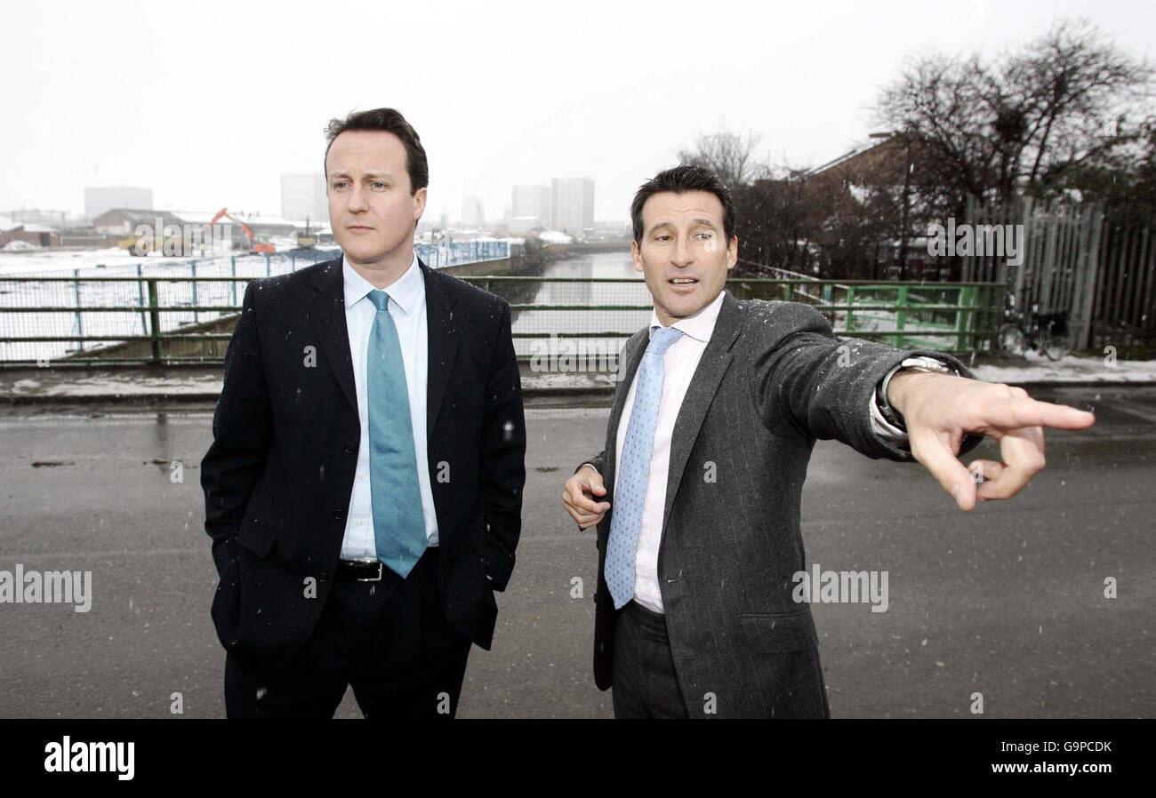 Leader of the Conservative Party David Cameron and Lord Coe look around ...