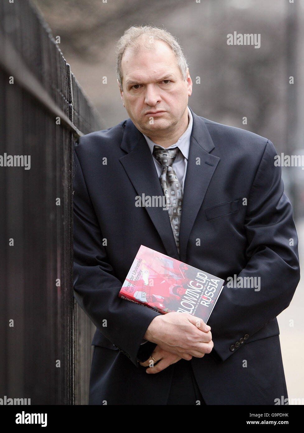 Russian historian Yuri Felshtinsky holds a copy of the book, 'Blowing ...