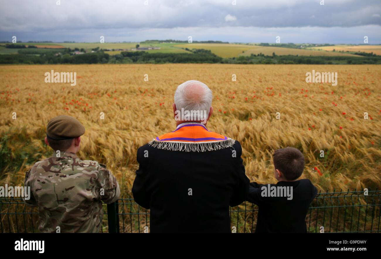 Former RUC officer Cecil Haire from Co Fermanagh and his grand children ...