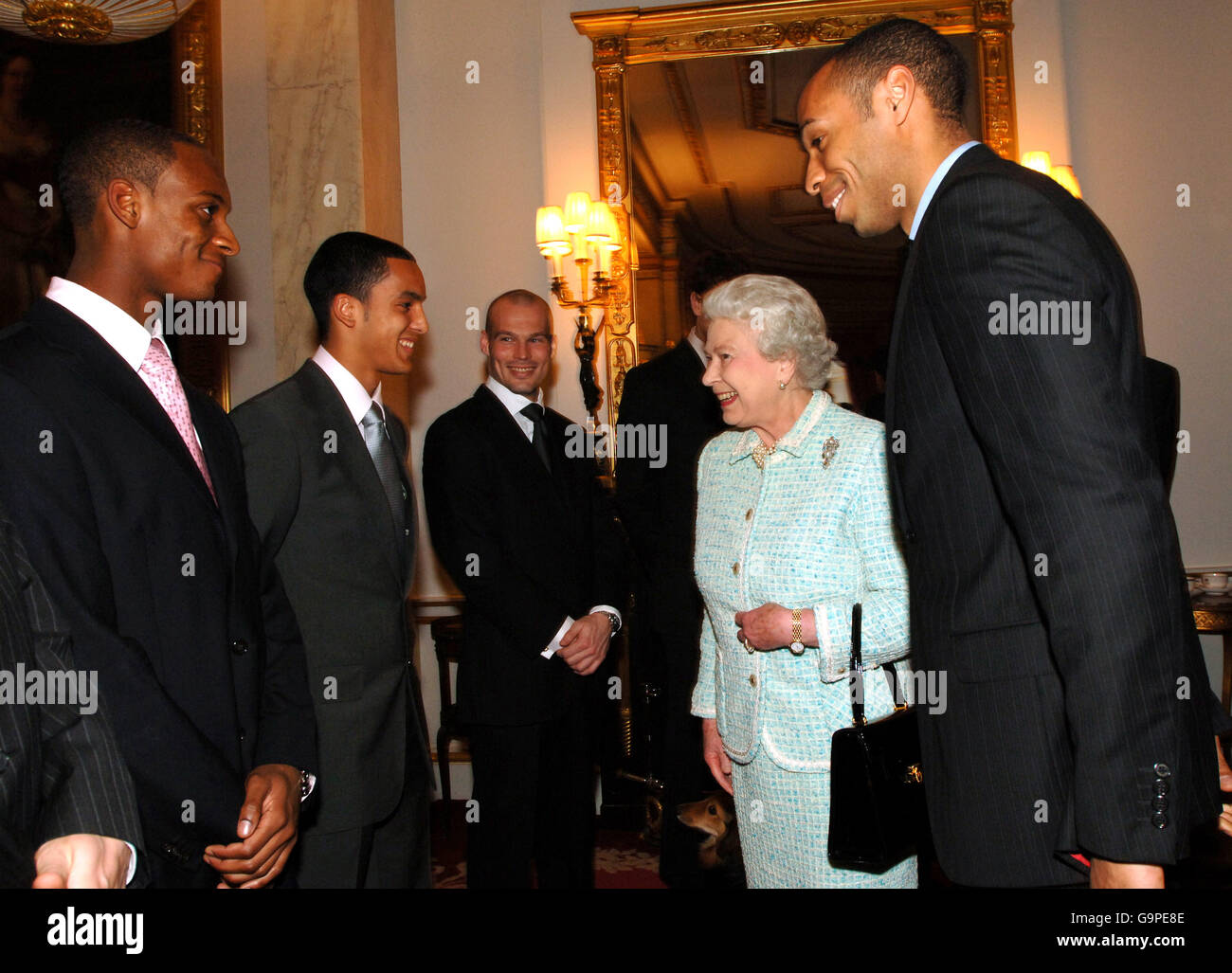 Britain's Queen Elizabeth II meets Arsenal football team members (left ...