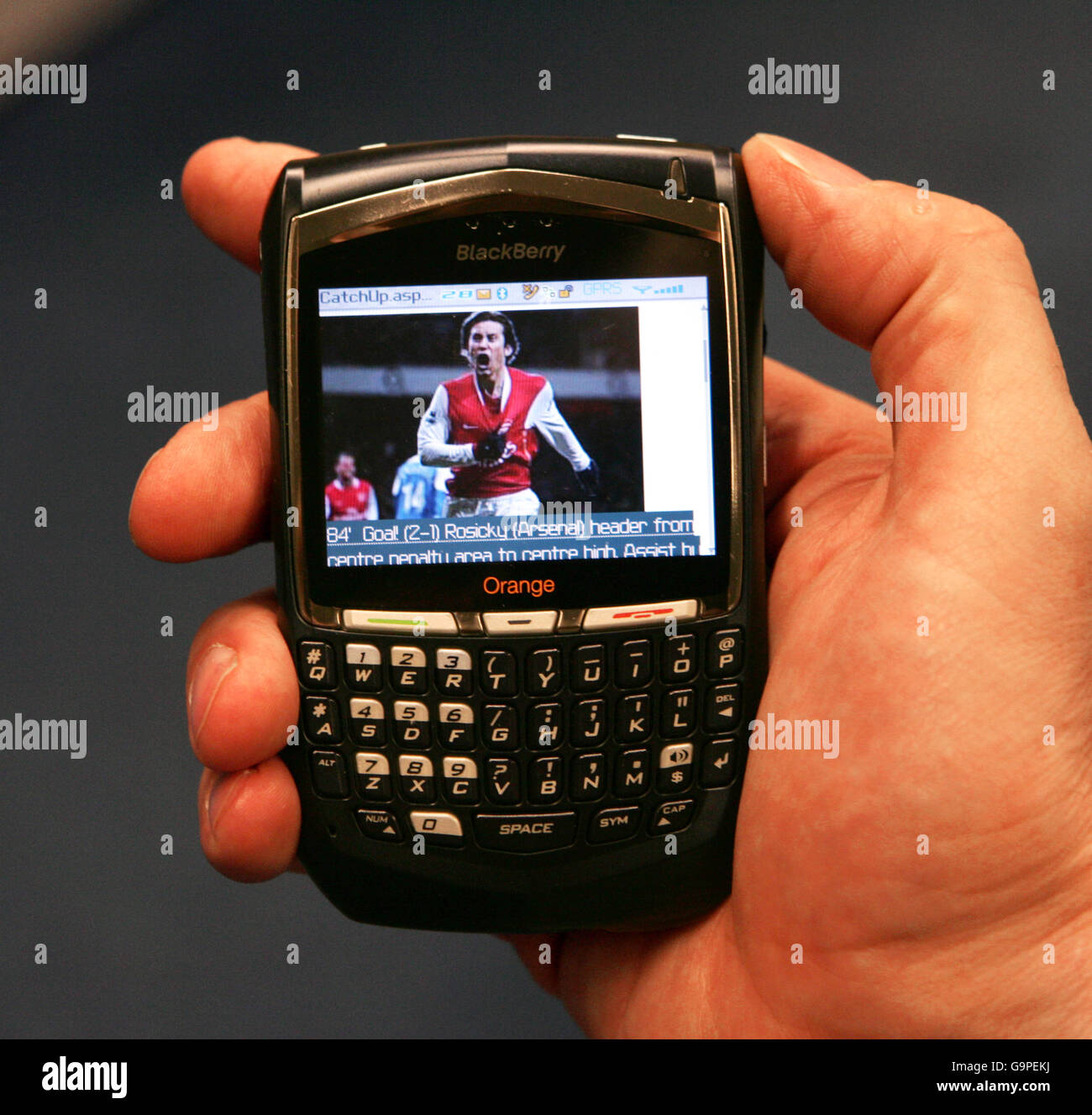 Game On in action. A Blackberry device displays Game On Stock Photo - Alamy