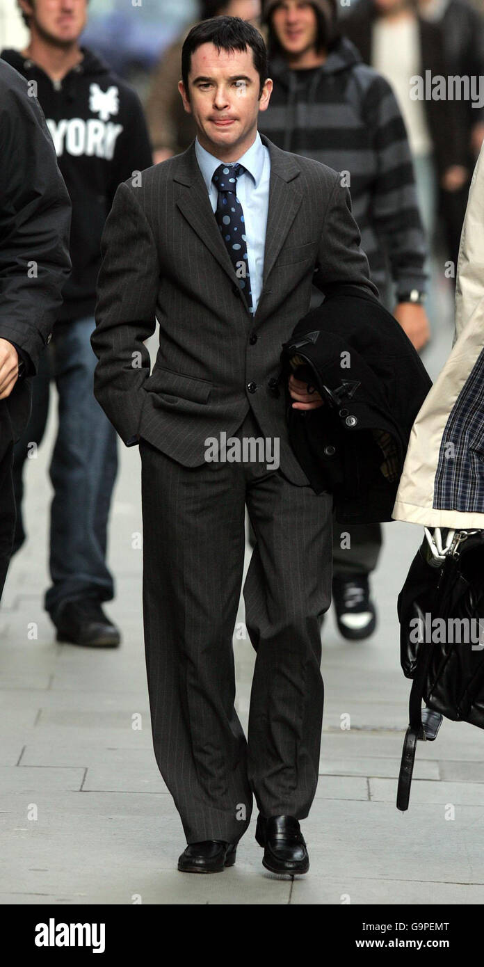 Full length arriving arrival suit hands in holding coat tongue hi-res ...