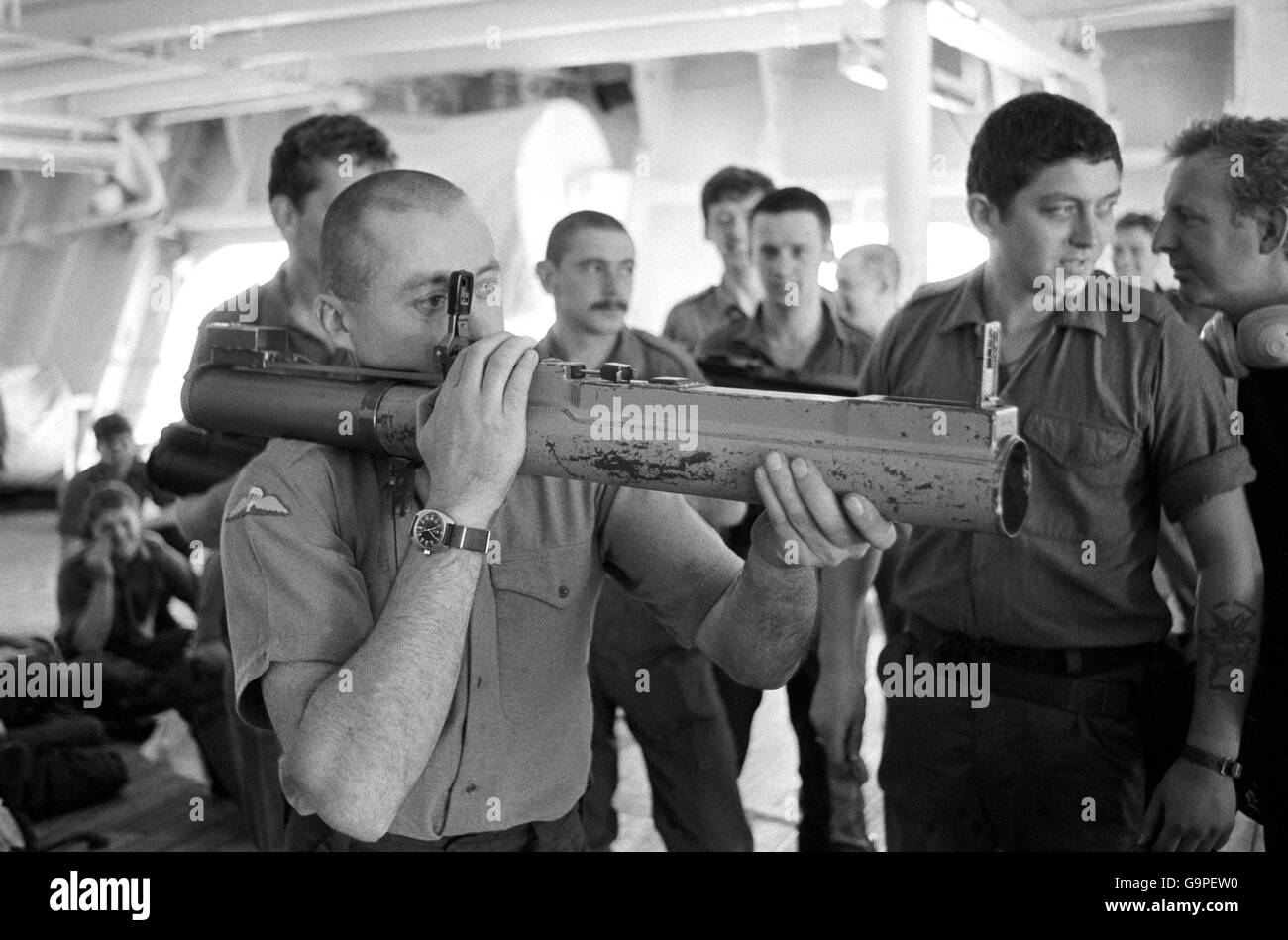 Weapons instructor Corporal "Chuck" Berry (right)drills men of "A ...