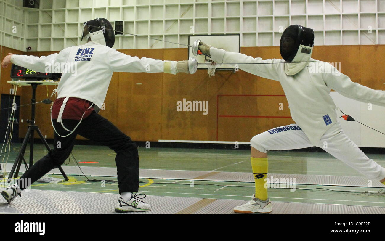 Epee fencers missing each other Stock Photo - Alamy