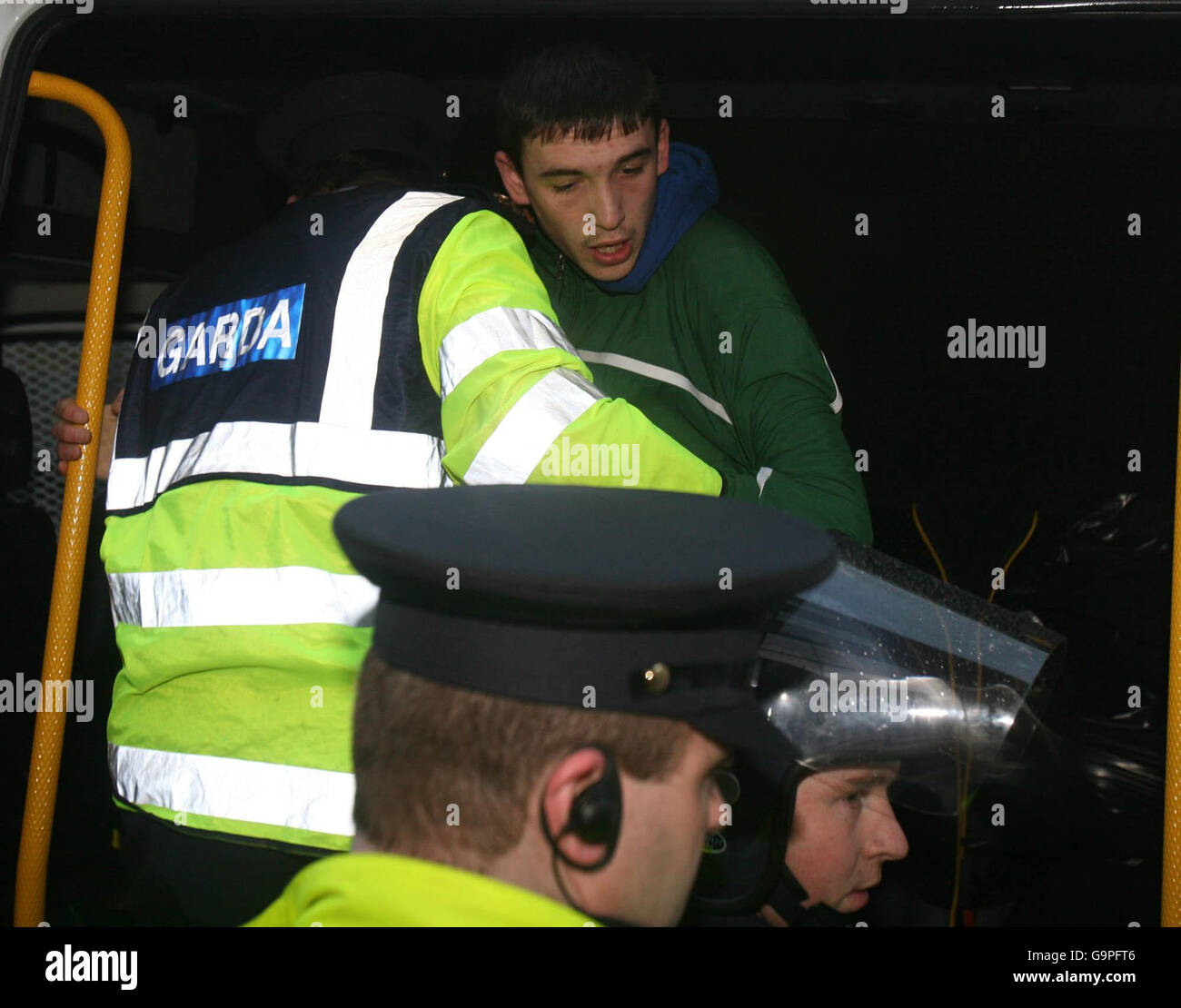 Garda (Irish Police Force) taking a protestor into custody Stock Photo ...