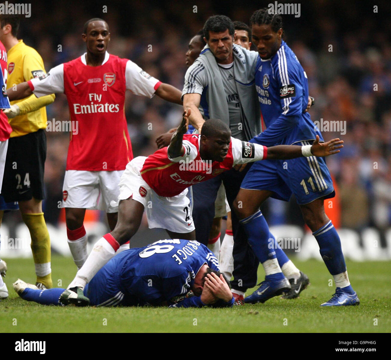 Wayne Bridge goes down holding his head during the Carling Cup final ...
