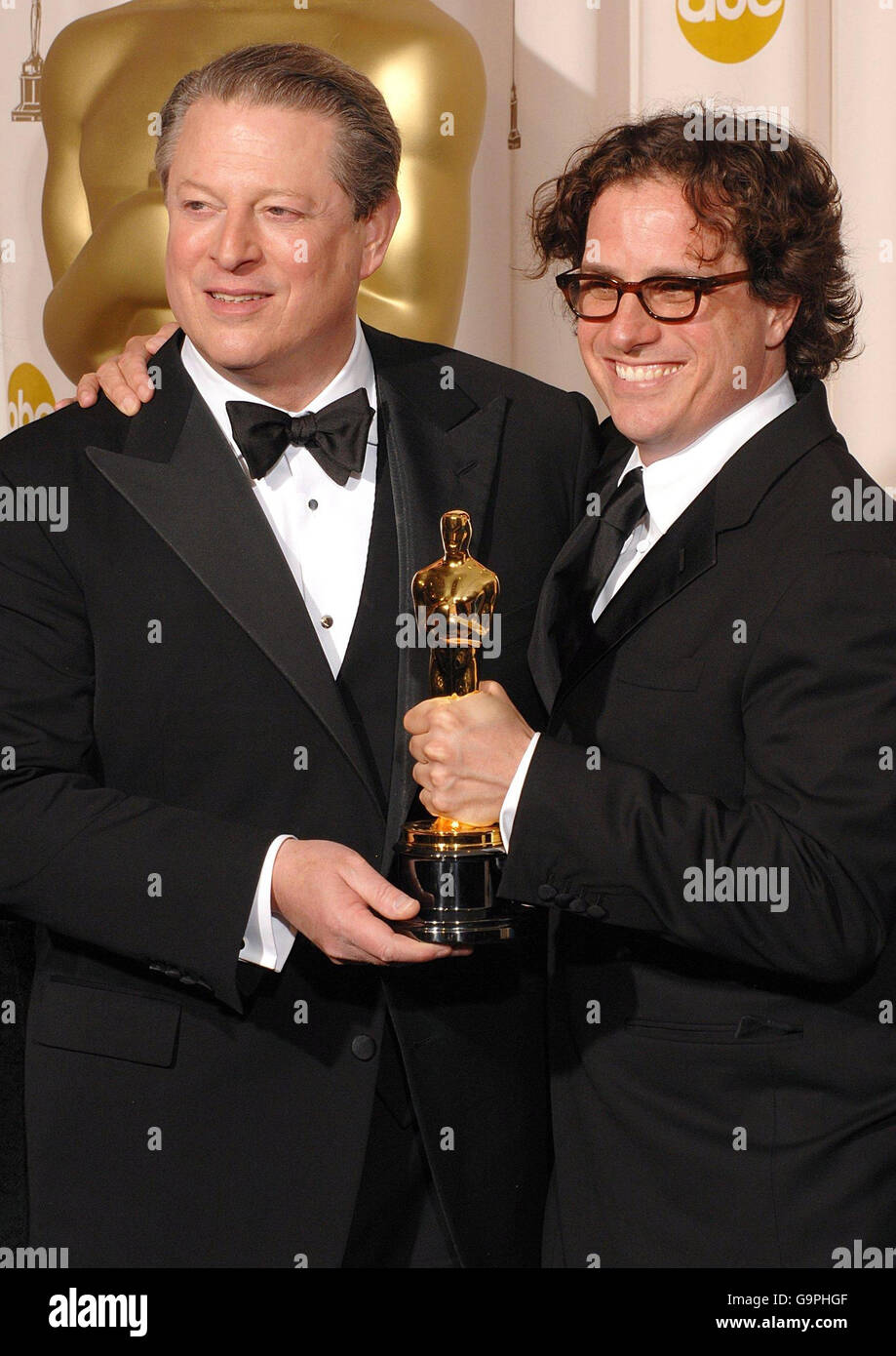 Awards holding award smiling film black suit hi-res stock photography ...