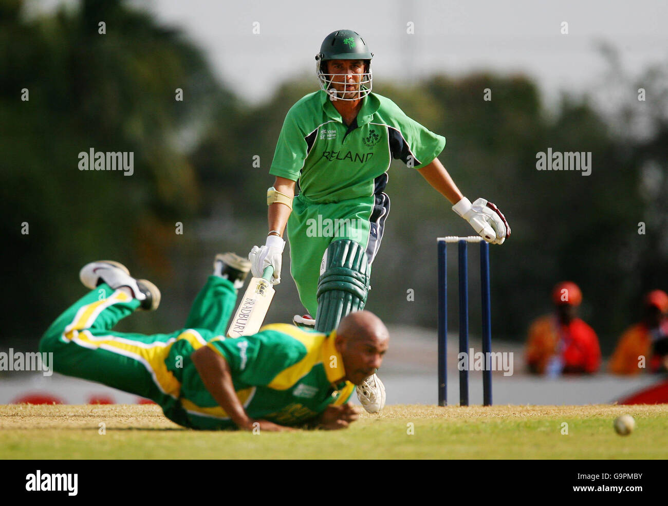 Full length action falling running bat ball mangrk hi-res stock ...