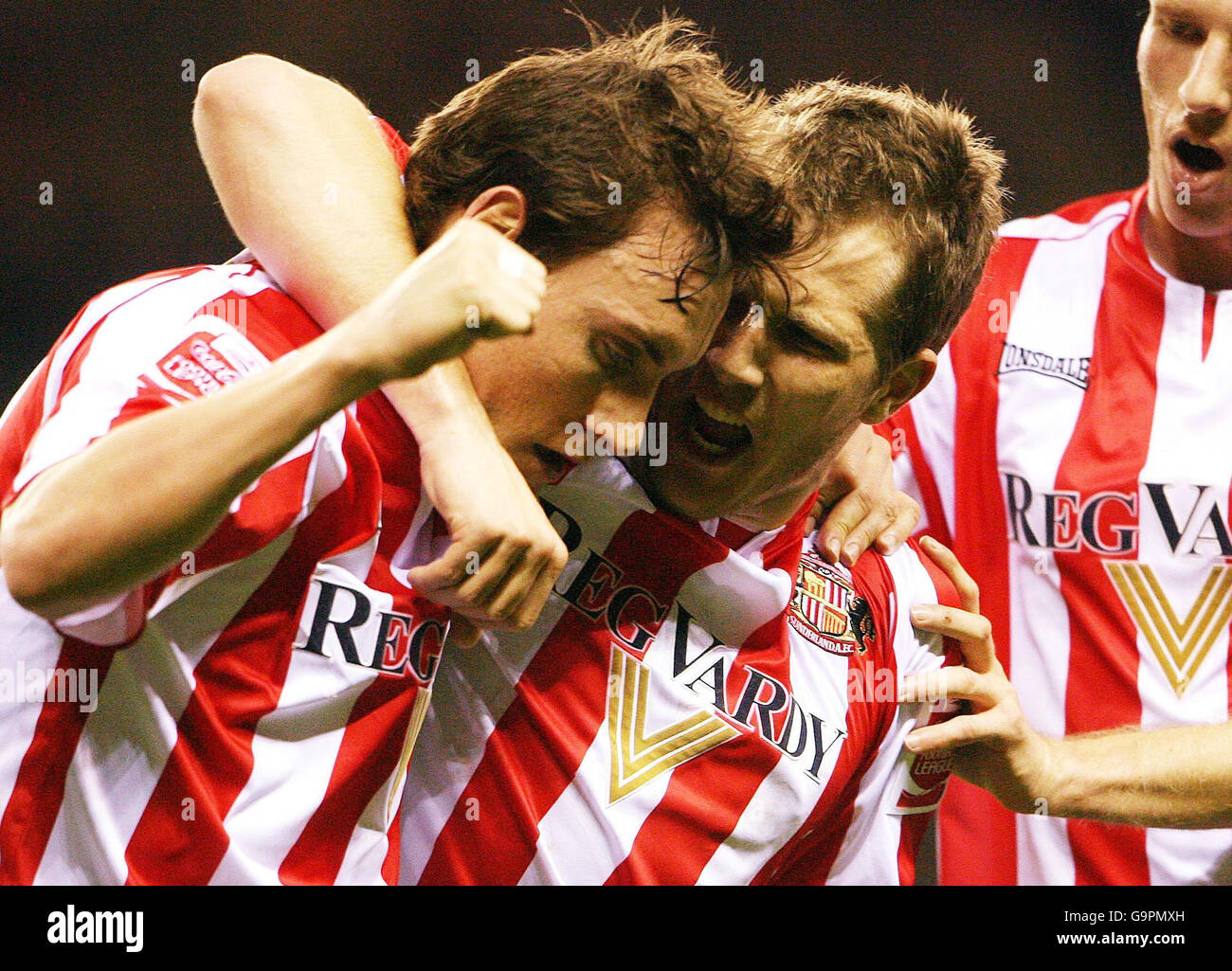 Sunderland's Dean Whitehead (left) celebrates after scoring during the ...