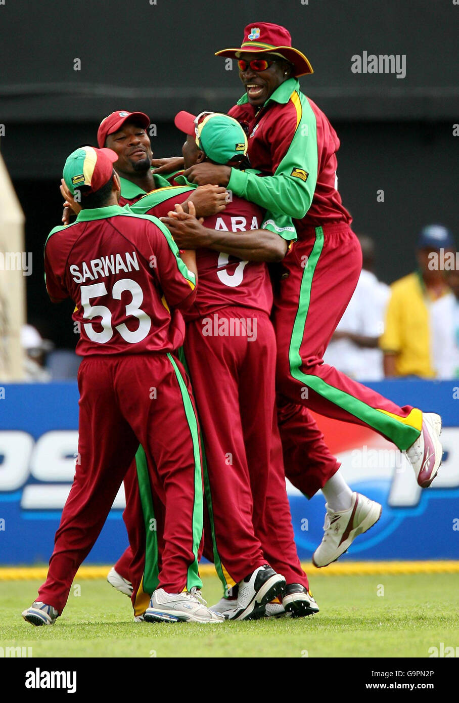 West Indies team-mates congratulate Dwayne Smith (second left) after ...