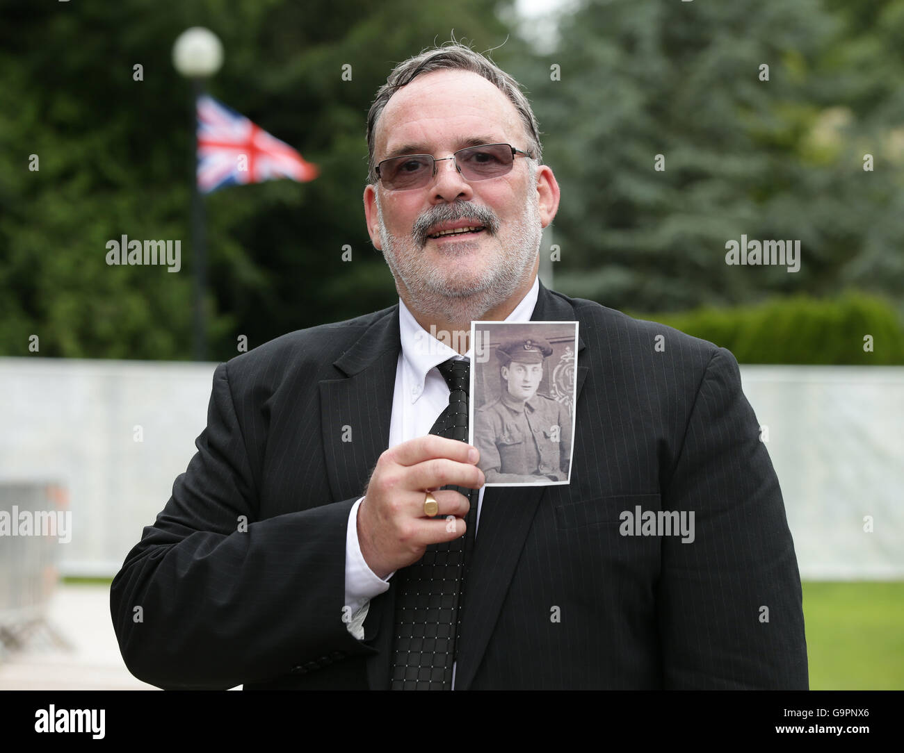 John Sharrock, 61, holds a picture of his great uncle, Private Percy ...