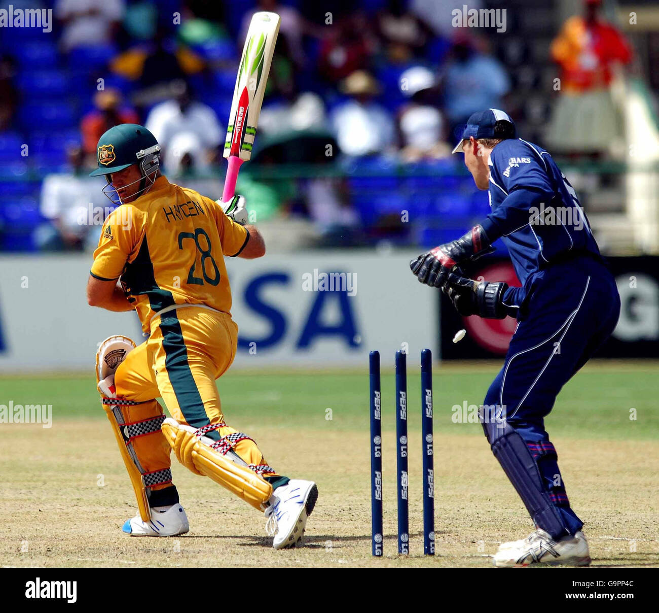 Scotland's Colin Smith attempts to stump Australia's Matthew Hayden ...