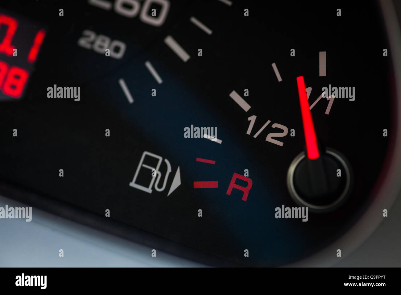 Close up shot of a car's dashboard with the fuel gauge Stock Photo - Alamy
