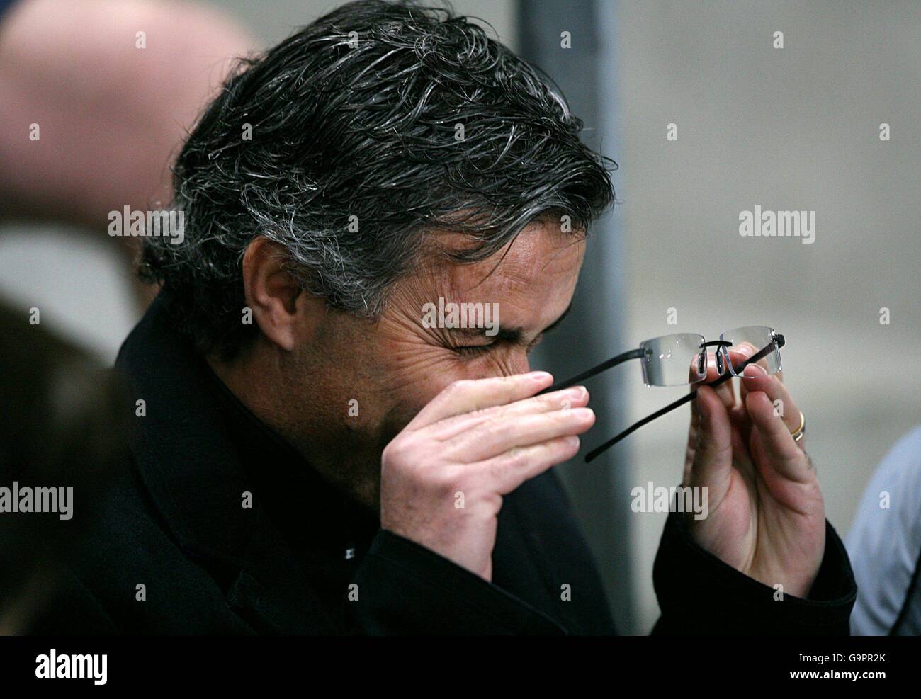 Chelsea manager jose mourinho looks through a pair of glasses hi-res ... Chelsea manager jose mourinho looks through a pair of glasses hi-res ...
