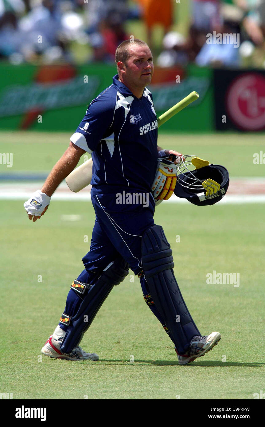 Scotland's Ryan Watson walks after being run out during the ICC Cricket ...