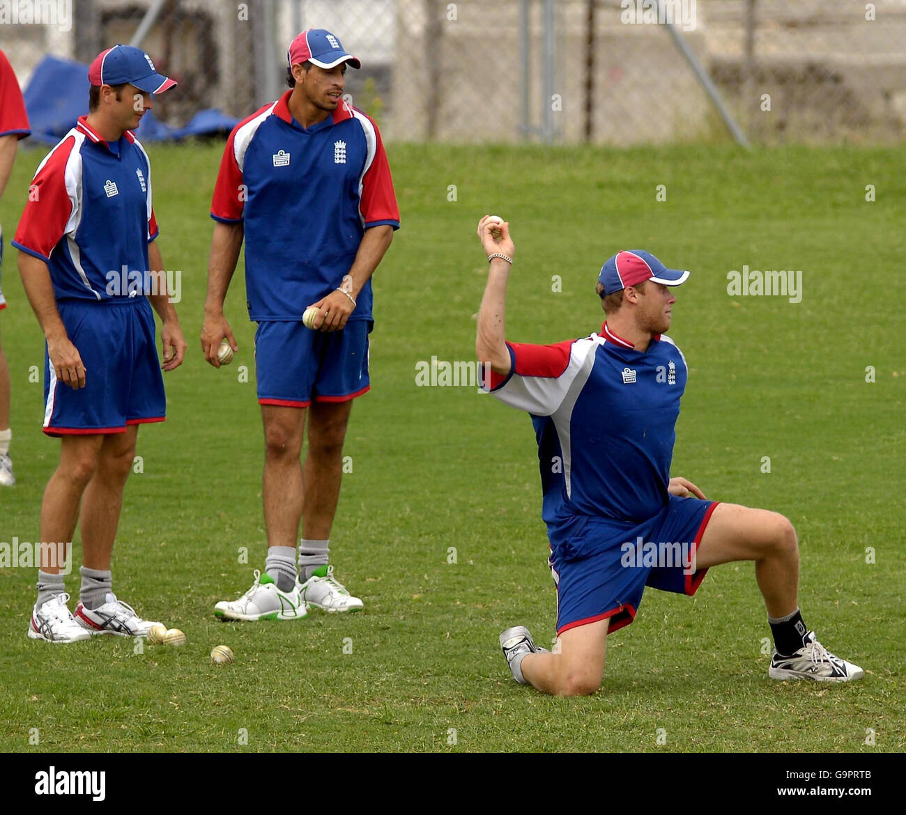 England's Michael Vaughan and Sajid Mahmood watch Andrew Flintoff ...