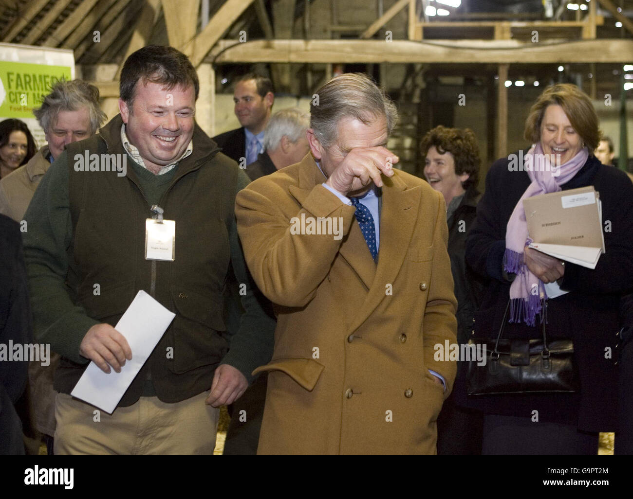 The Prince of Wales laughs at farmer Doug Wanstall's inadvertant joke ...