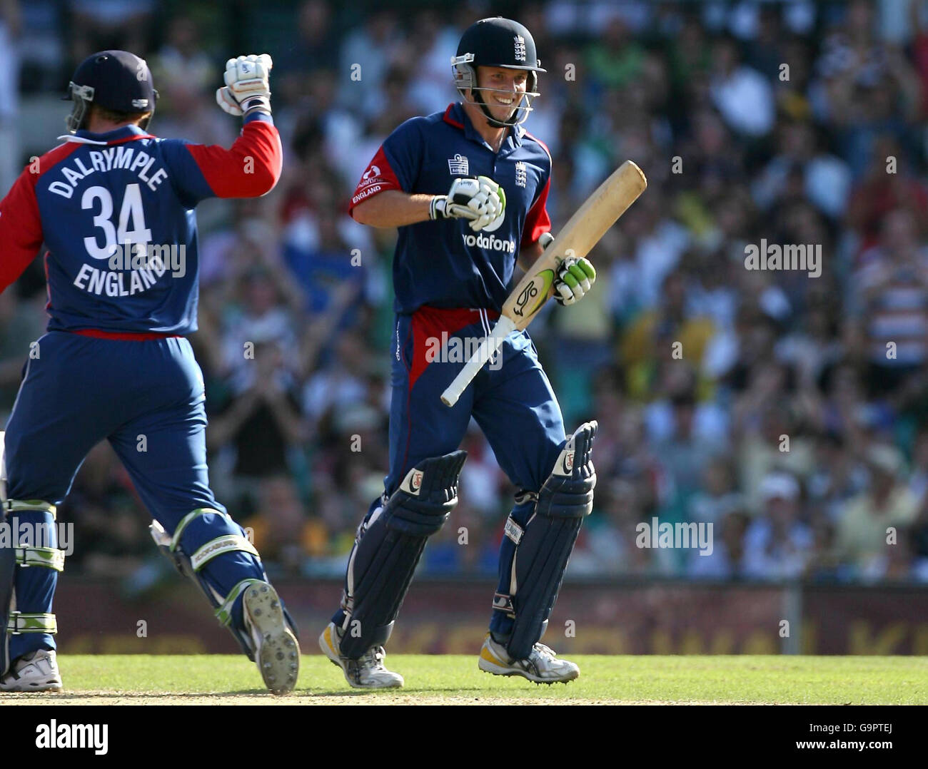 England's Ed Joyce celebrates his century with Jamie Dalrymple during ...