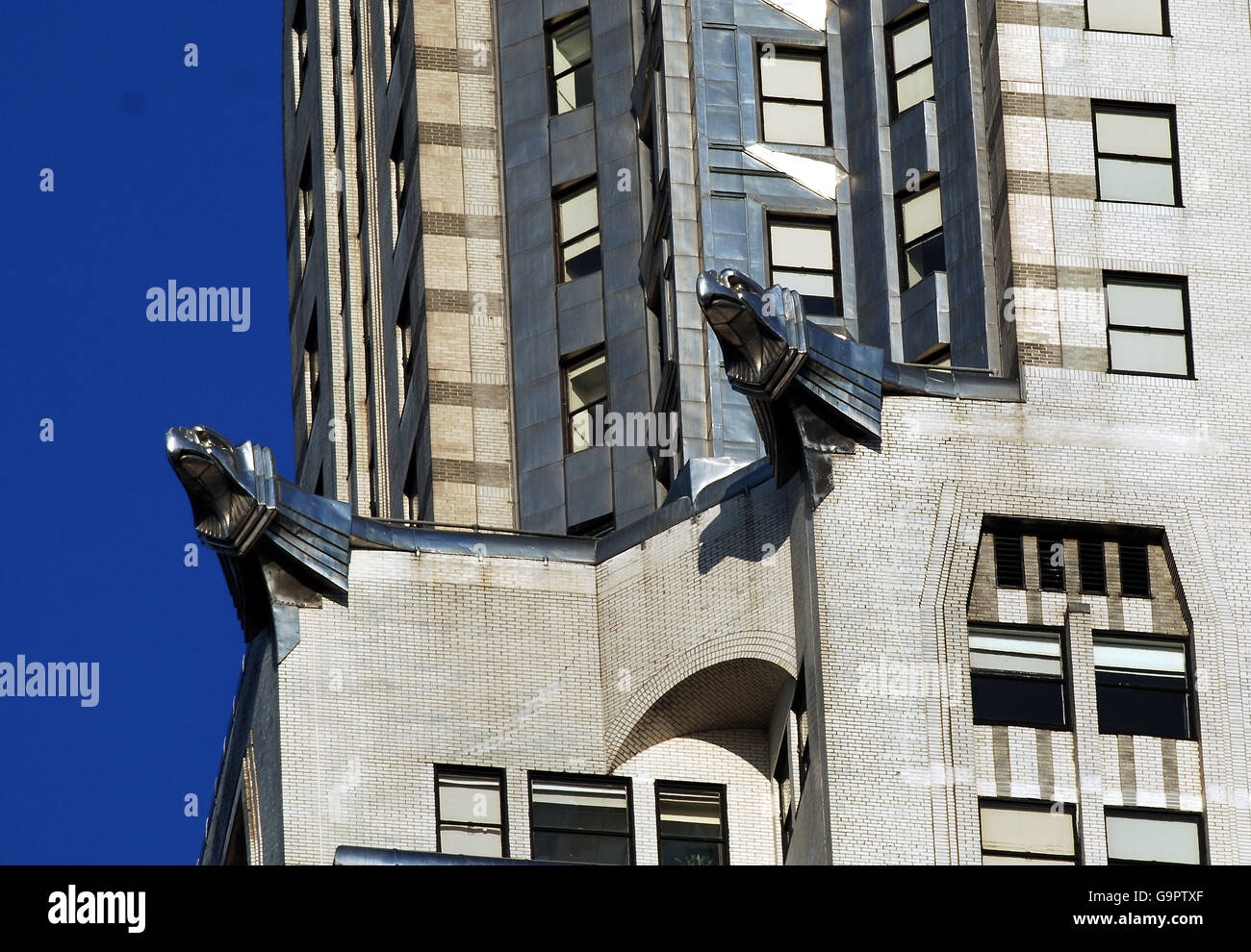 A pair of stainless steel gargoyles which look out from the corners of ...