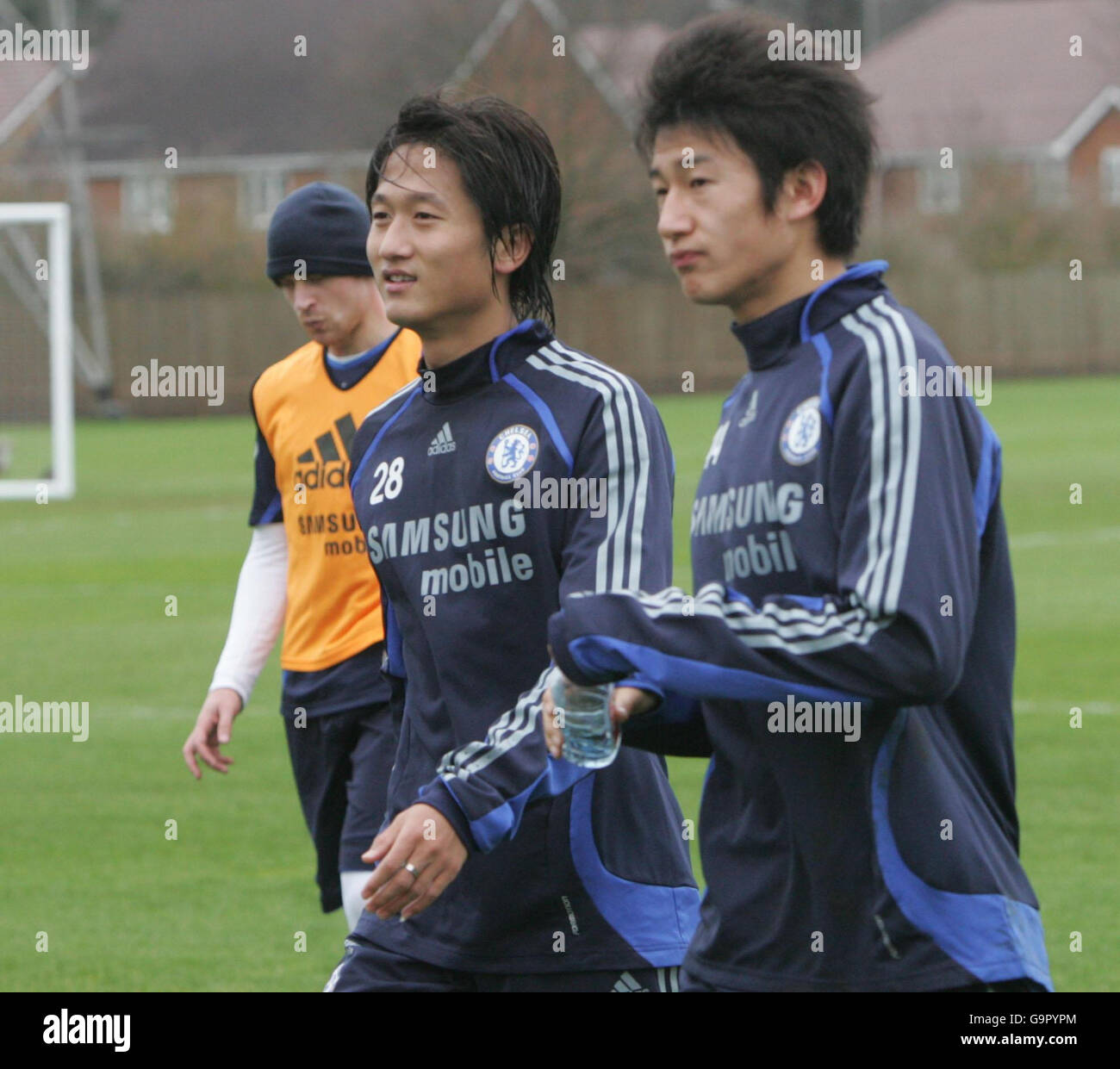 Team China's Yu Hai (right) and Yuan Weiwei walk from the pitch ...