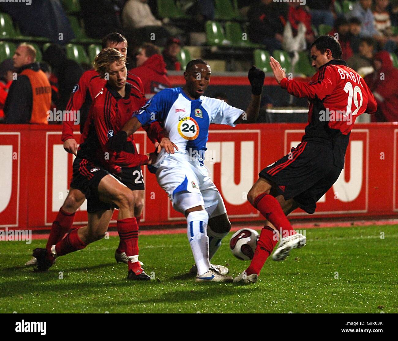 Blackburn Rovers' Jason Roberts is tackled Bayer Leverkusen's Marko ...