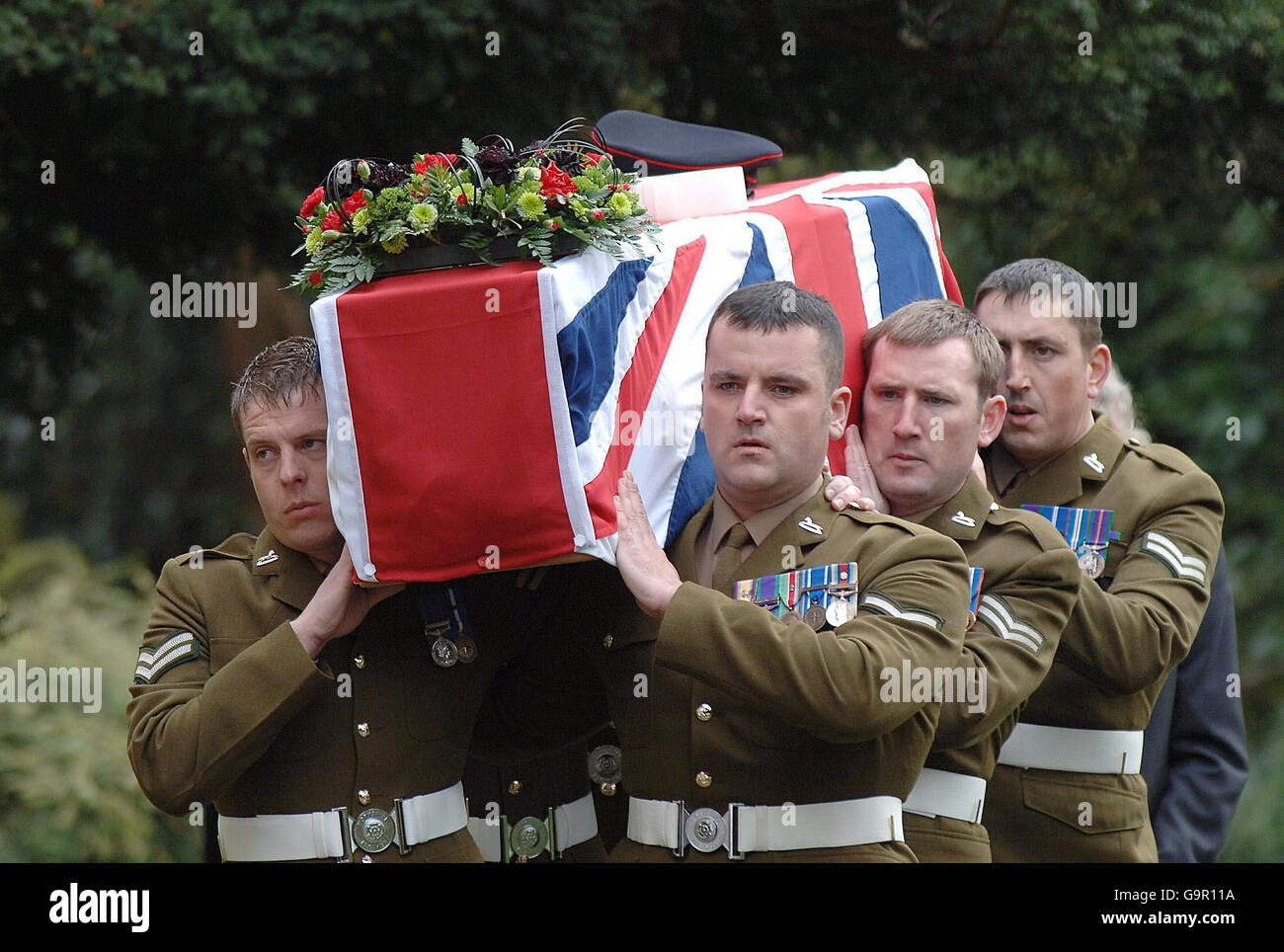 Soldiers from the Yorkshire Regiment carry the coffin of Private Luke ...