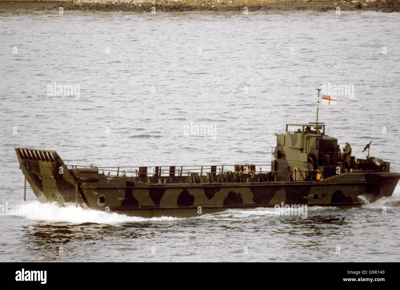 A landing craft of the British Falklands Task Force moves through San ...