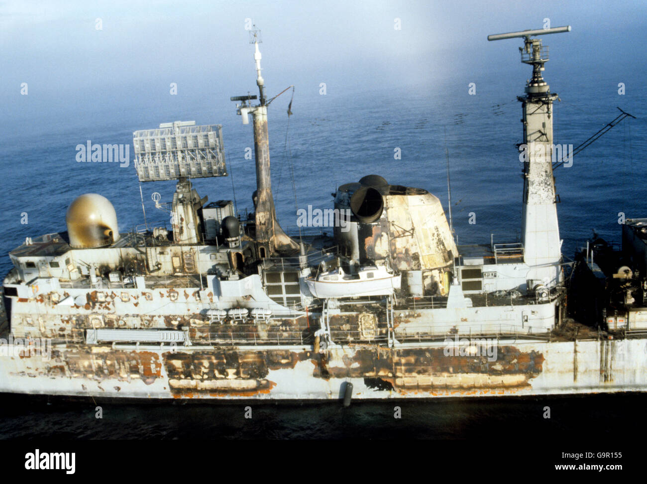 The fire damage to HMS Sheffield after being hit by an Argentine Execet ...