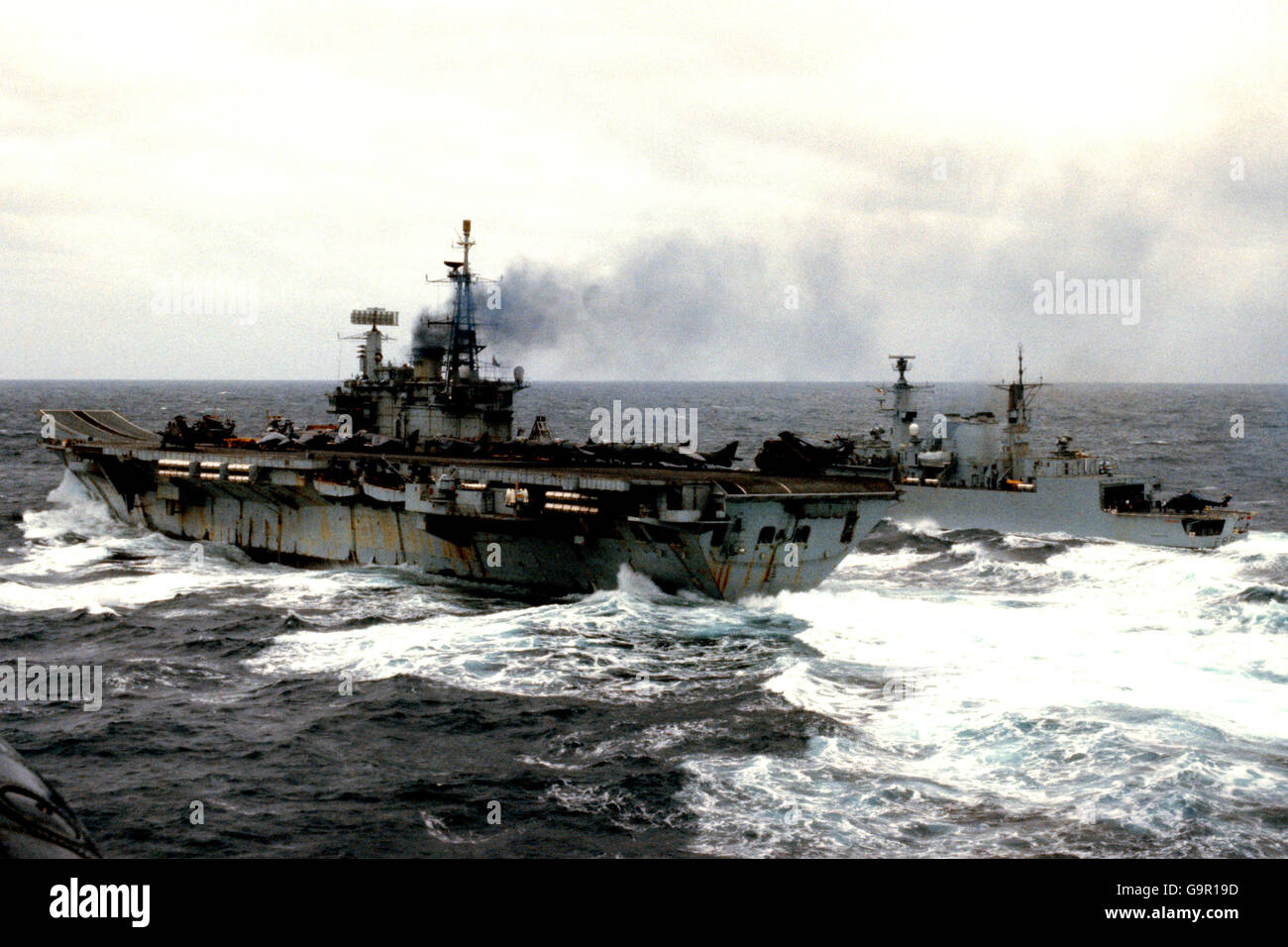 HMS Hermes and HMS Broadsword, a type 22 frigate equipped with Sea wolf ...