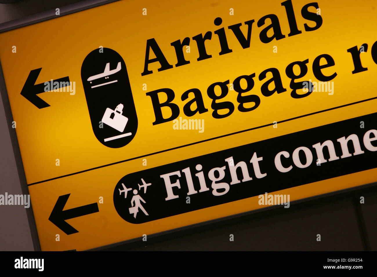 Signs in the arrivals area of Terminal Three of London's Heathrow ...
