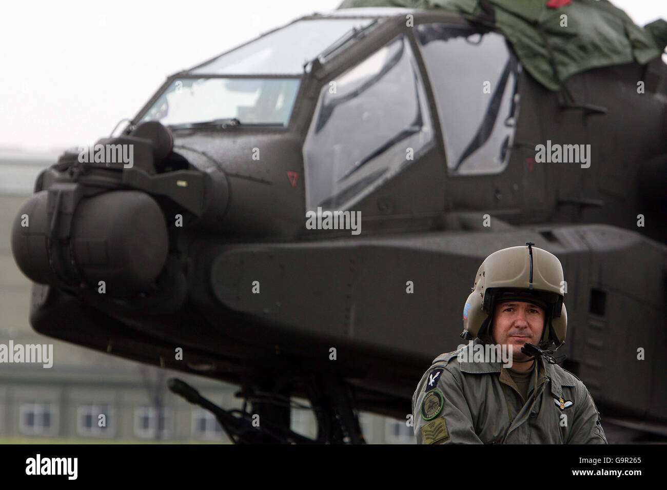 39-year-old Staff Sergeant Carl Bird with an Apache helicoptor at RAF ...