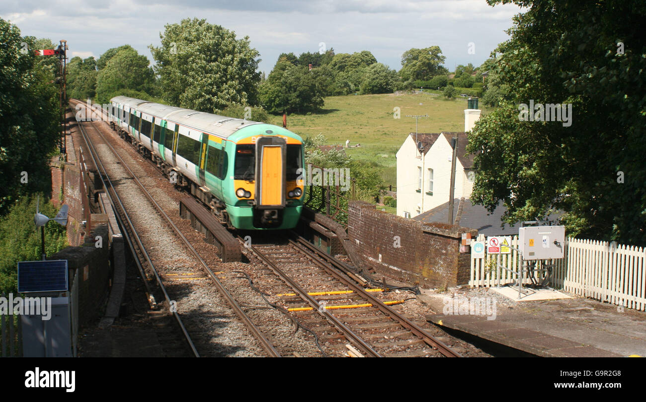 Class 377 Electrostar passing Amberley Stock Photo - Alamy