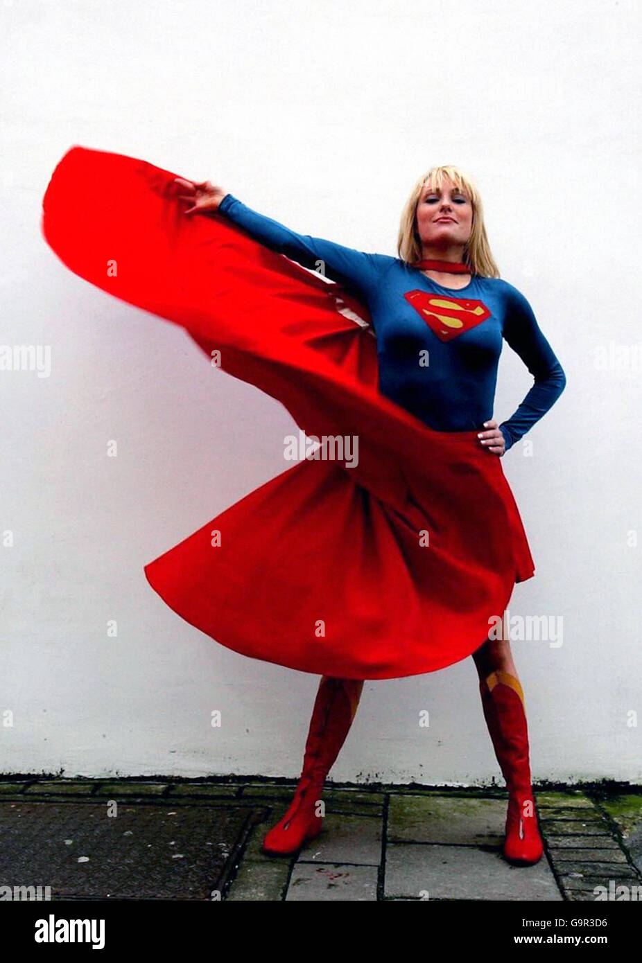 Model Serena Carter wears a Supergirls costume from the 1984 film ...