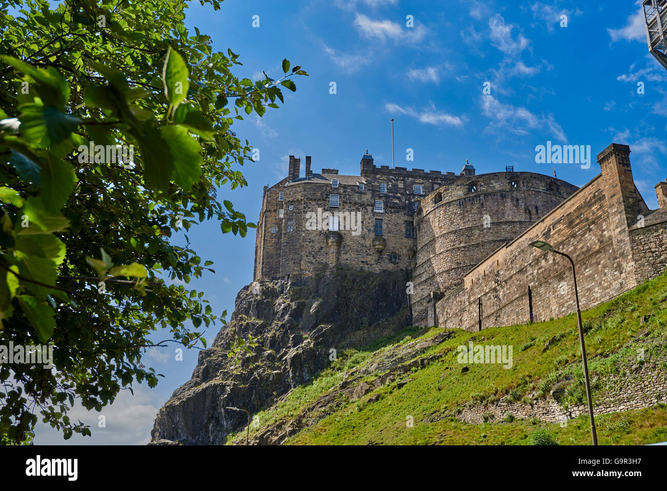 Edinburgh Castle is a historic fortress, which dominates the skyline of ...
