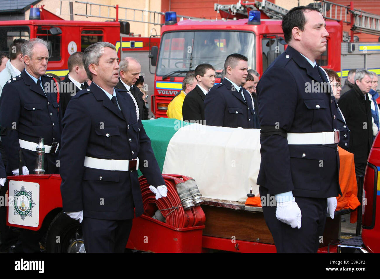 The funeral of volunteer firefighter Mike Liston makes its way past ...