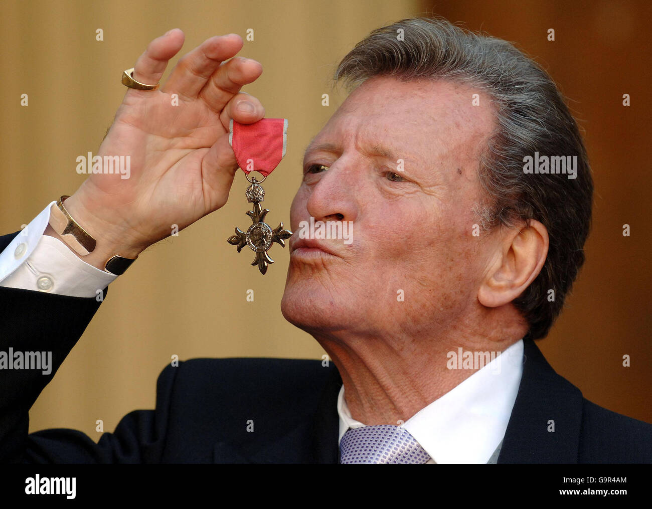 Former Coronation Street actor, Johnny Briggs, after collecting an MBE ...
