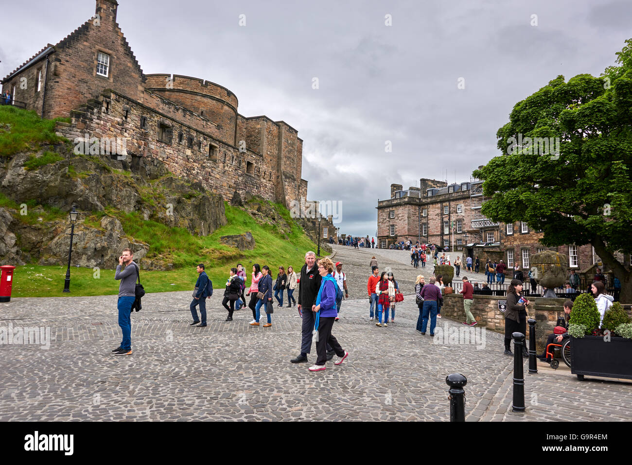 Edinburgh Castle is a historic fortress, which dominates the skyline of ...