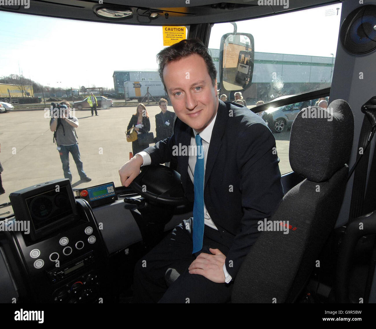 Conservative leader David Cameron in the cab of a Modec M4 electric ...