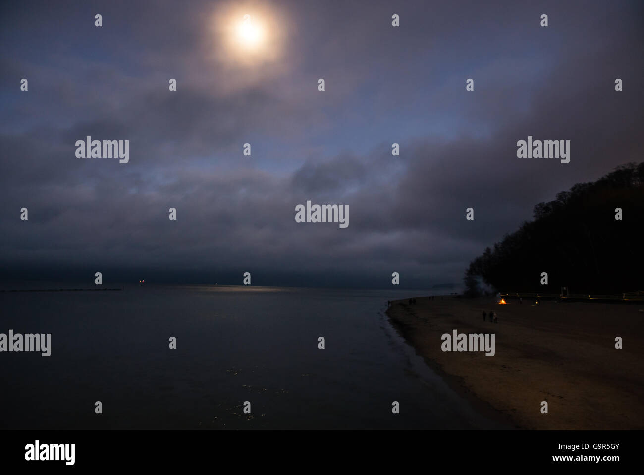 Full moon over the sea Stock Photo - Alamy