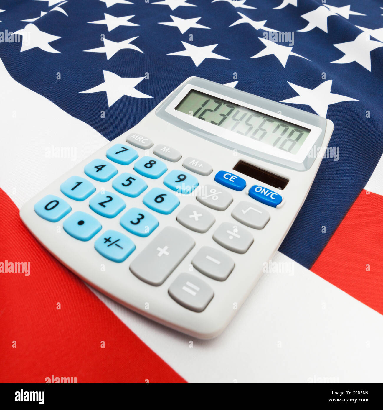 Part of close up studio shots series of national flags with calculator ...