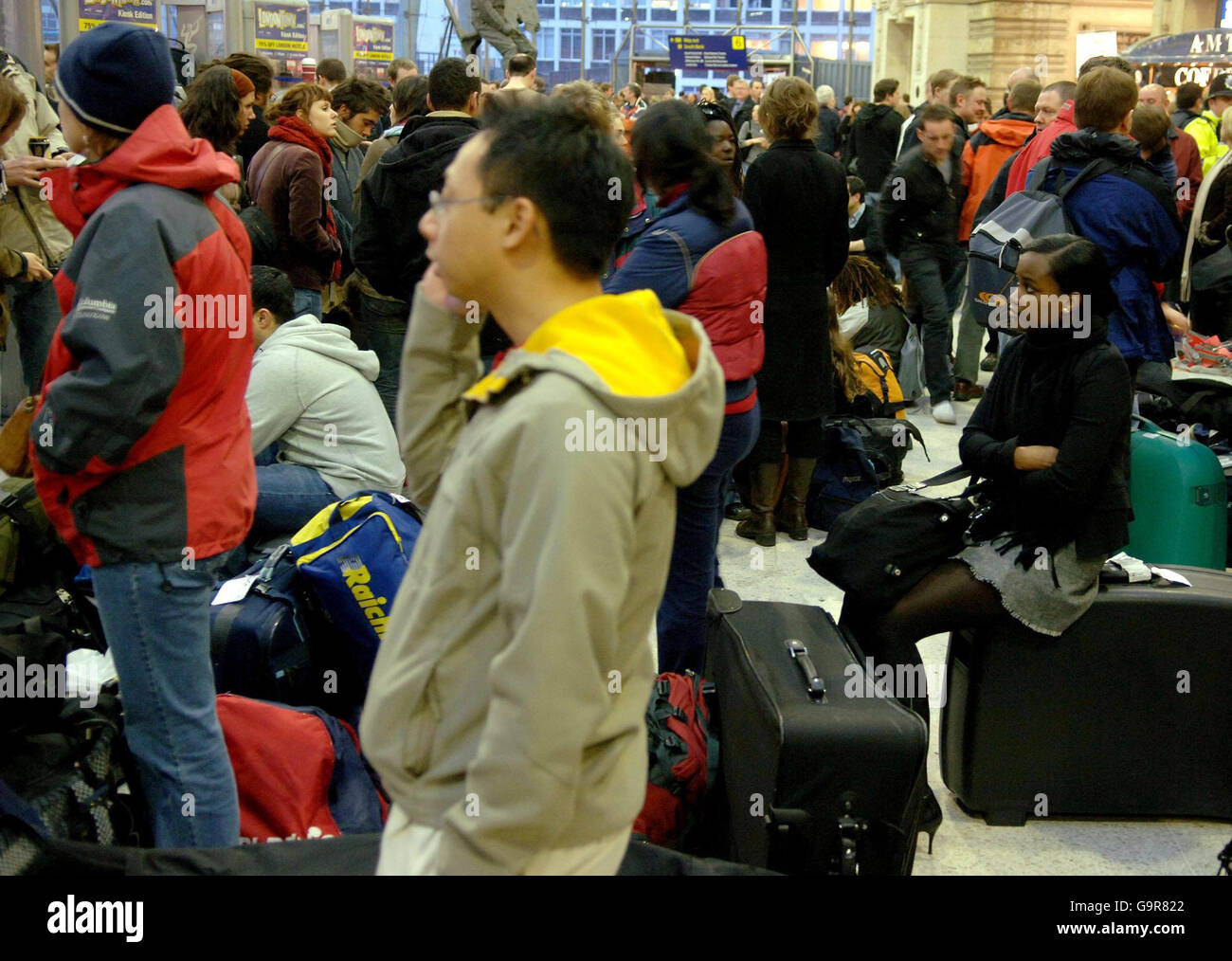 Stranded passengers at Waterloo Station, central London, as trains are ...