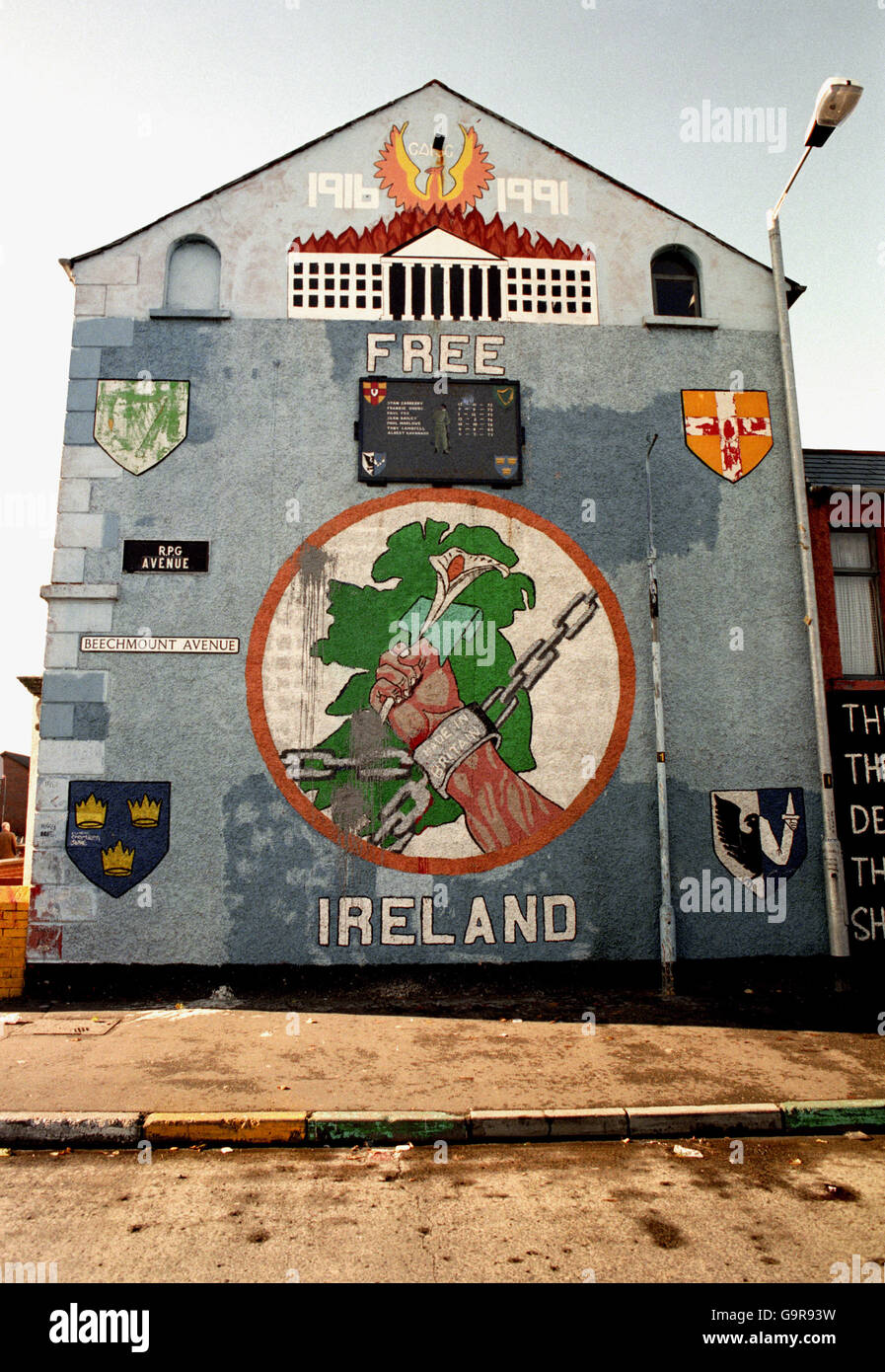 Republican murals in Belfast painted on the side of a house Stock Photo ...