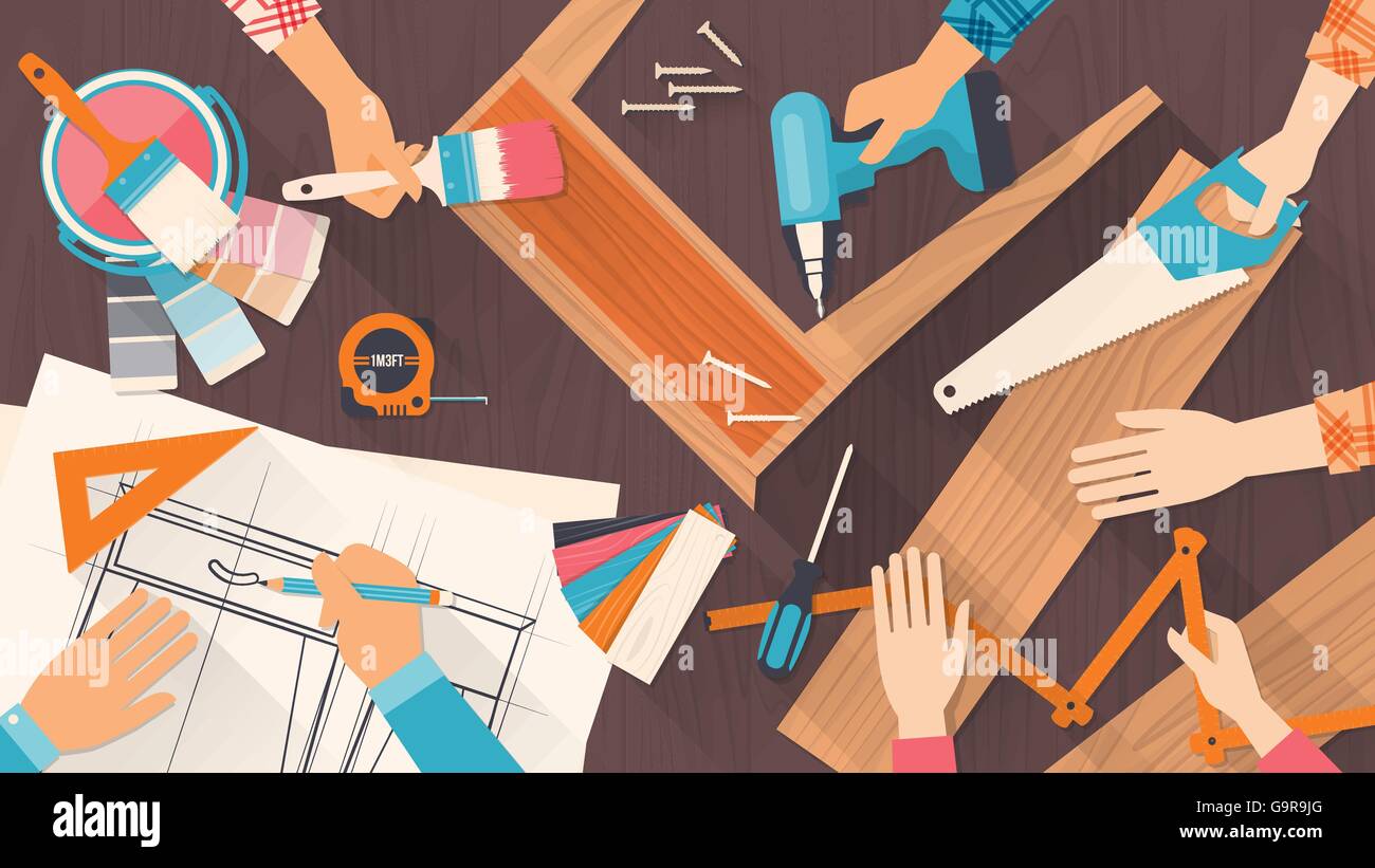 Team of workers using DIY tools and working on a carpentry project ...