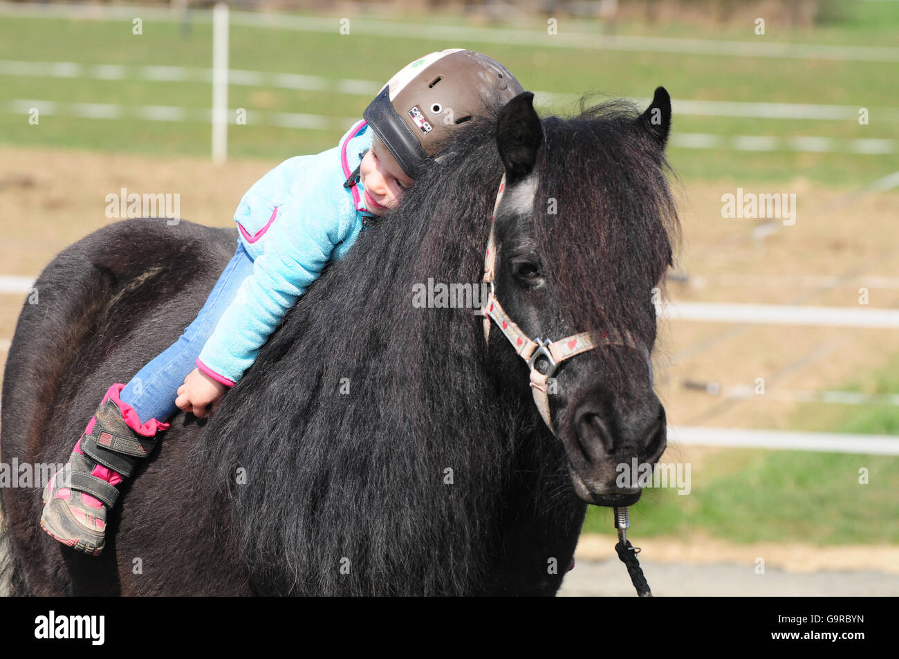 Girls riding shetland pony hi-res stock photography and images - Alamy