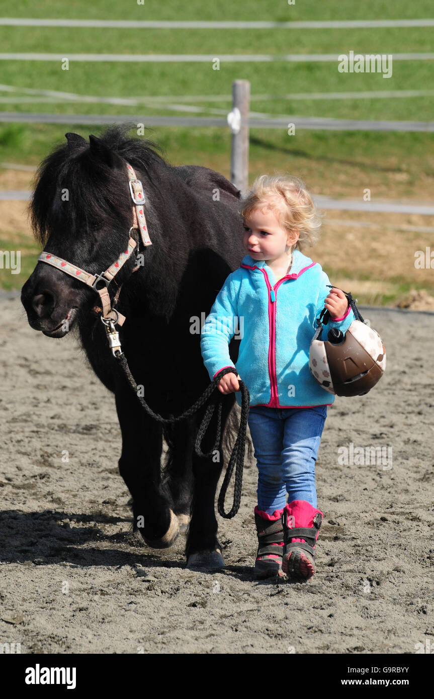 Girls Riding Shetland Pony High Resolution Stock Photography and Images ...