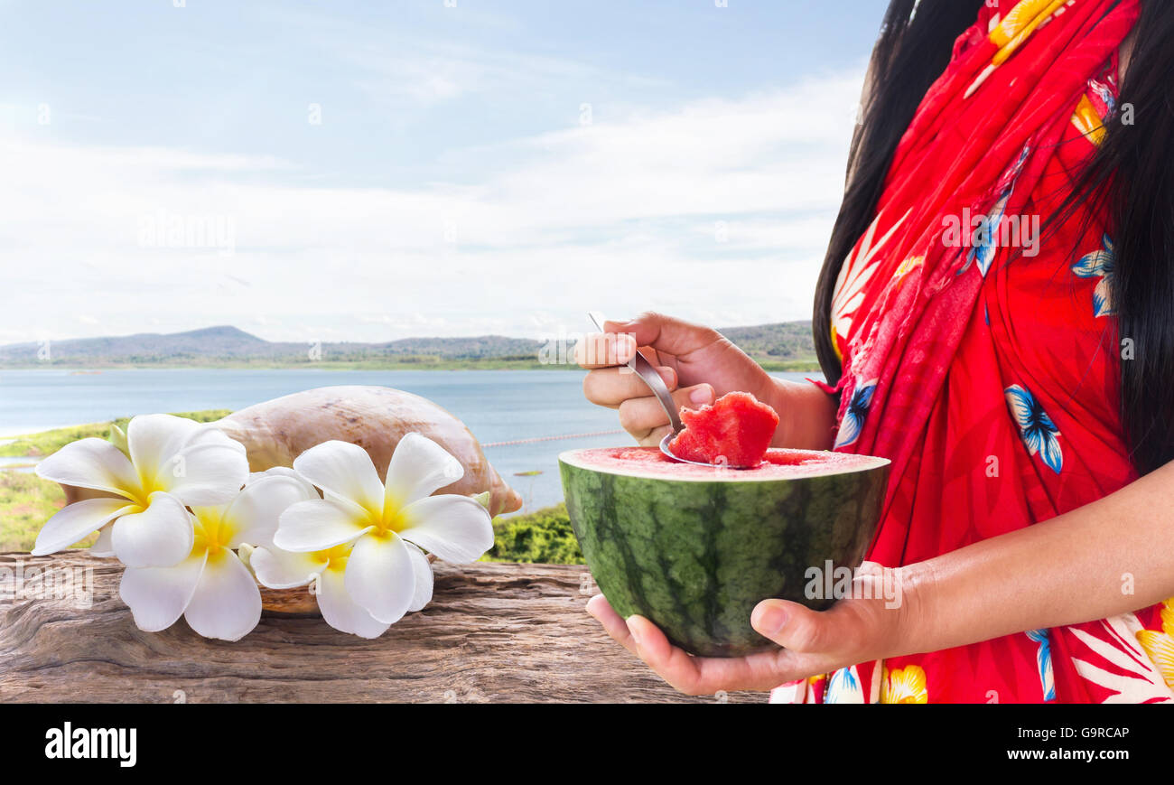Women with red simply summer dress hand holding half watermelon, women ...