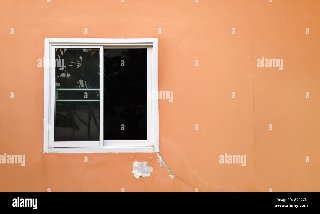 Deteriorated exterior paint of house wall, abandoned home wall, unfixed ...