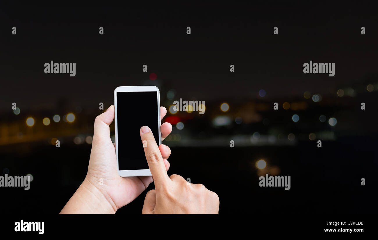 Hands with finger press or touch on smart phone blank screen or mobile ...